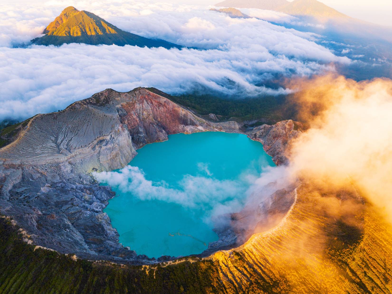 This Rare Volcano Spews Blue Lava & Is Becoming A Dark Tourism Hot Spot